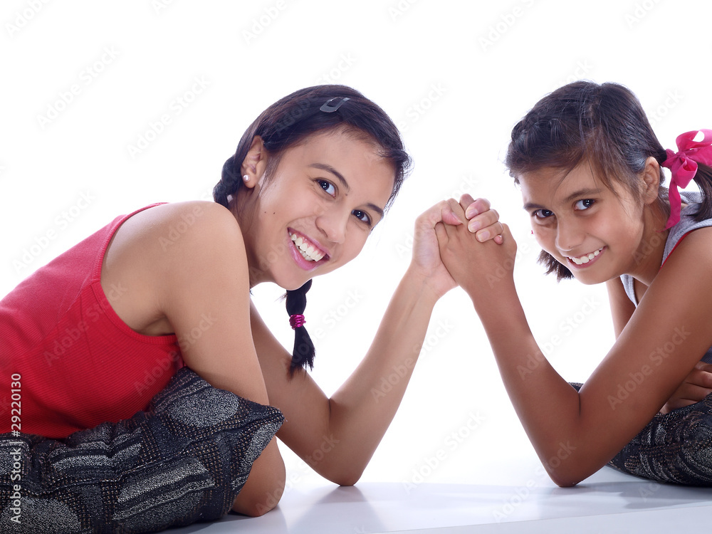girls armwrestling Stock Photo | Adobe Stock