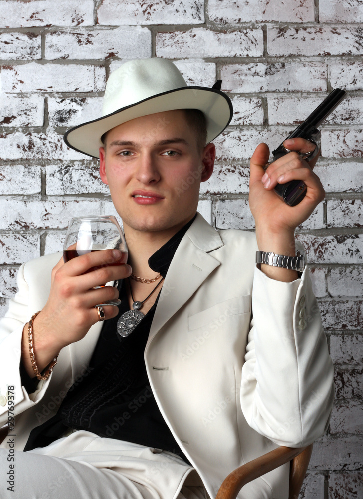 Mafia. The man in a suit with gun Stock Photo | Adobe Stock