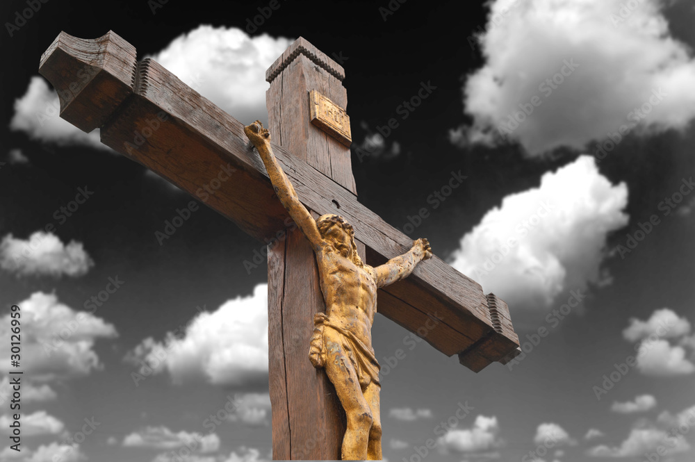 The crucifixion from a tree with Jesus's gilt figure Stock Photo ...