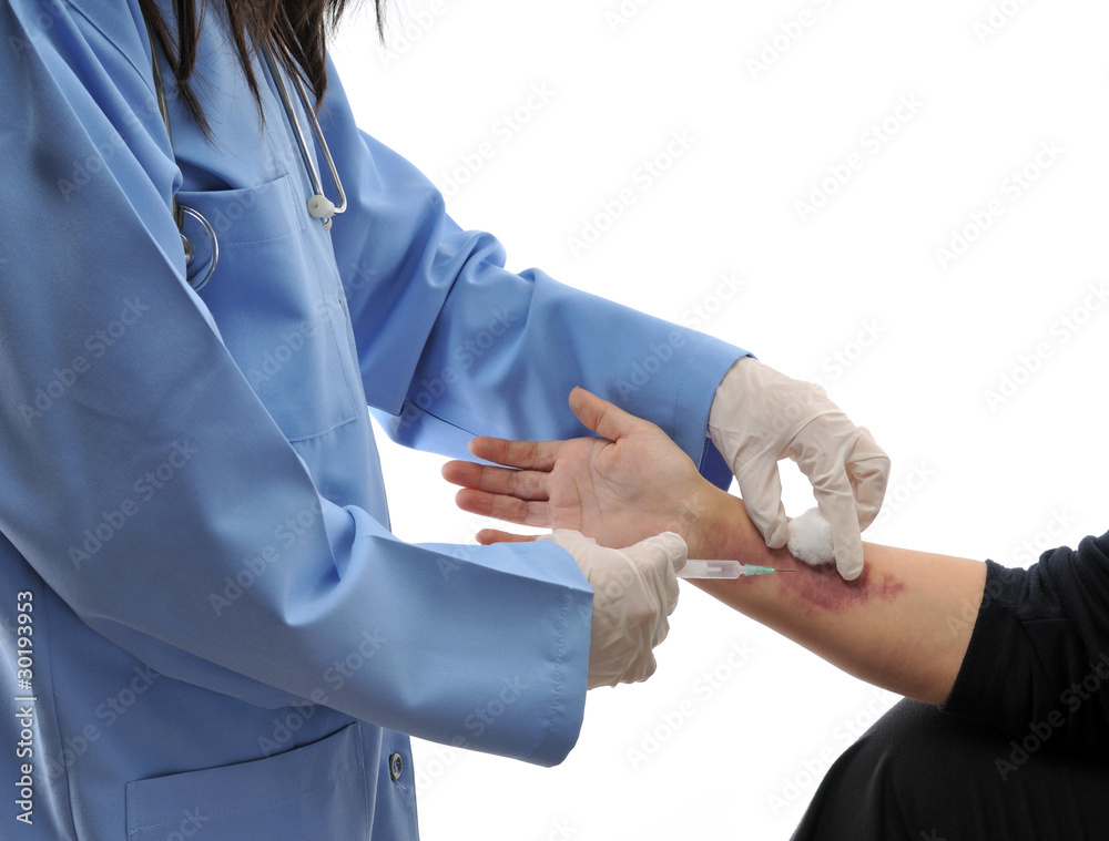 Doctor giving an injection to bruised arm of a female isolated. Stock ...