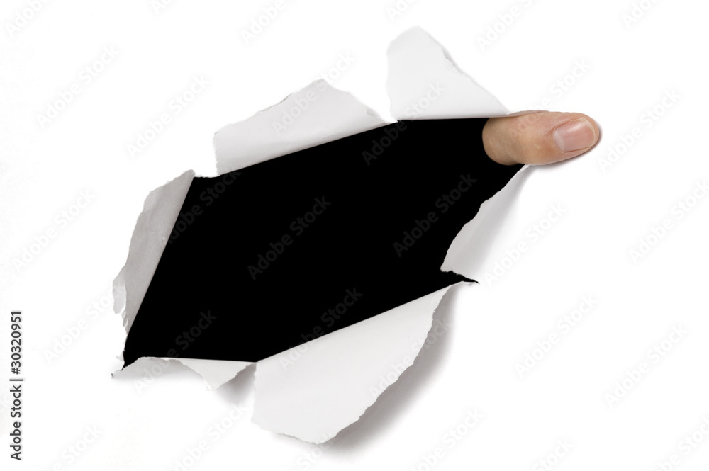 Finger tearing through white paper. Break out! Stock Photo | Adobe Stock