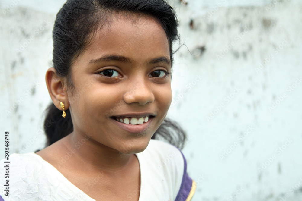 Smiling Indian Girl Looking At Camera Stock Photo | Adobe Stock