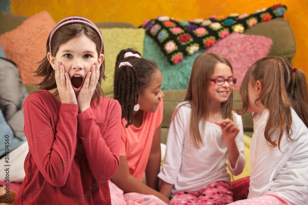 Shocked Little Girl at Sleepover Stock Photo | Adobe Stock