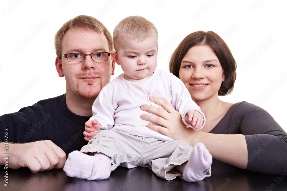 Eltern mit sitzendem Baby Stock Photo | Adobe Stock