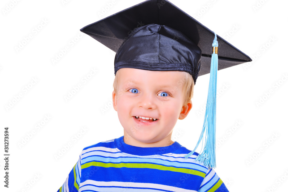 Cute little boy in graduation gown Stock Photo | Adobe Stock