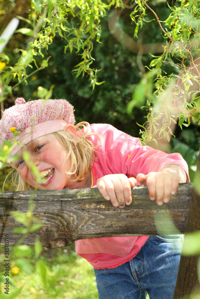 Kind im Garten Stock Photo | Adobe Stock