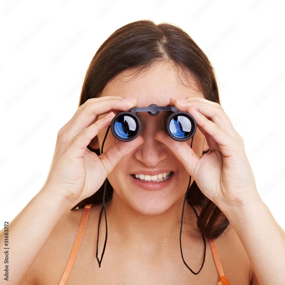 Frau schaut durch Fernglas Stock Photo | Adobe Stock