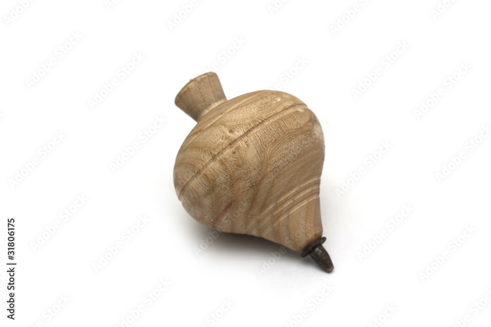 One wooden spinning top isolated in white background Stock Photo ...