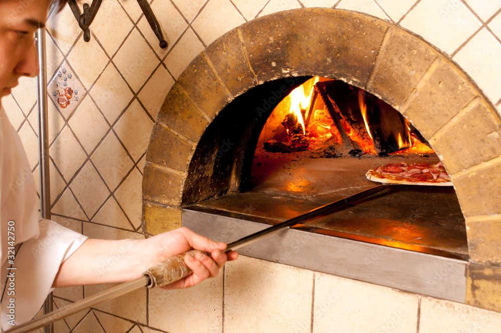 Chef making a Pizza Base Stock Photo | Adobe Stock