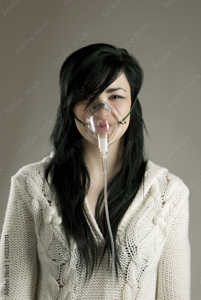 girl with oxygen mask Stock Photo | Adobe Stock
