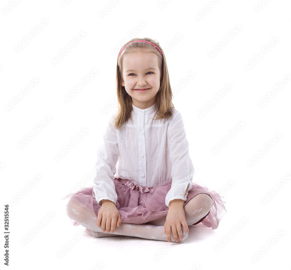 Adorable Little Girl Sitting Cross Legged Stock Photo | Adobe Stock