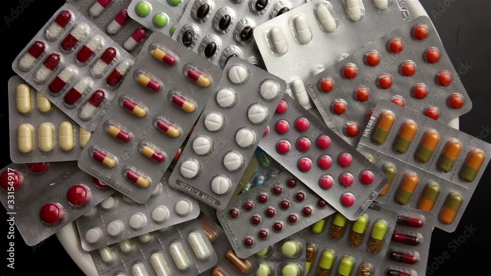 Different pills in a loop Stock Video | Adobe Stock