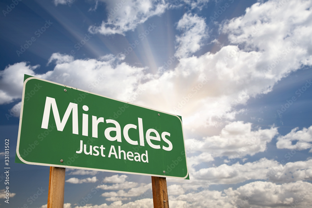 Miracles Green Road Sign Against Clouds Stock Photo | Adobe Stock