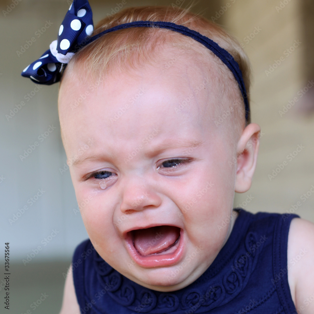 crying baby girl Stock Photo | Adobe Stock