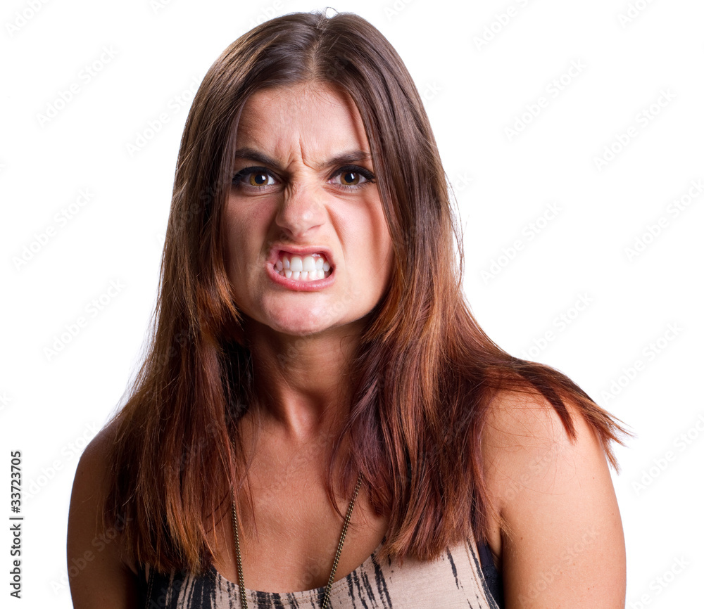 Angry woman snarls at the camera Stock Photo | Adobe Stock
