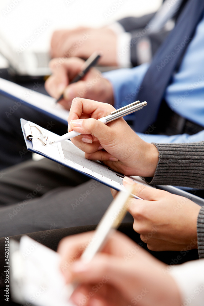 Writing down notes Stock-Foto | Adobe Stock