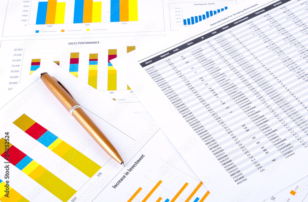 financial chart, datasheet and pen. Stock Photo | Adobe Stock
