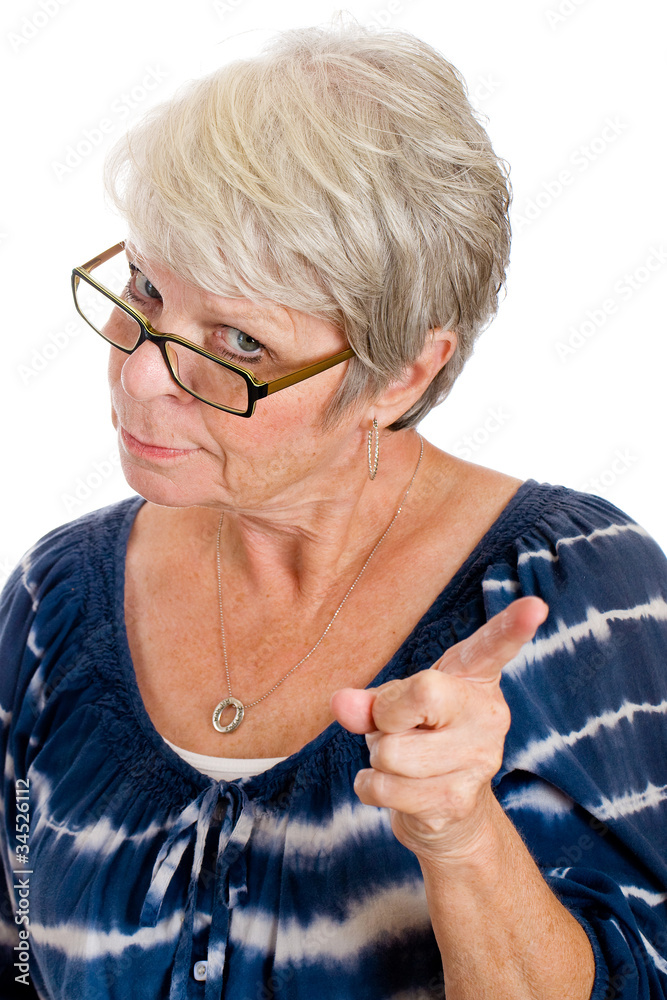 mature woman wagging her finger Stock Photo | Adobe Stock