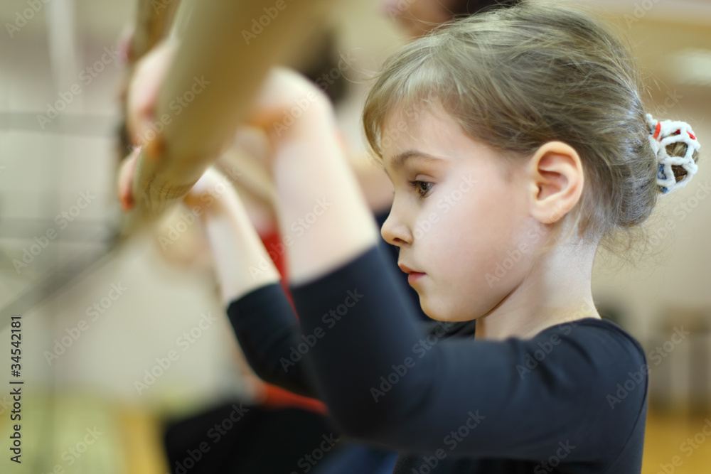 serious face of little girl in ballet class Stock Photo | Adobe Stock