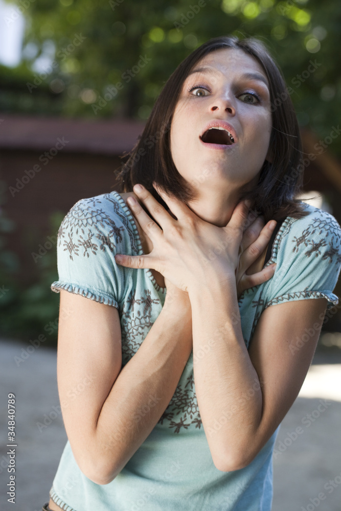 nervous woman strangling herself Stock Photo | Adobe Stock