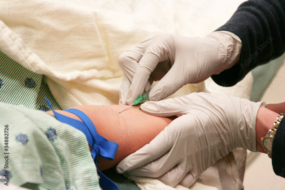 Starting an IV Stock Photo | Adobe Stock