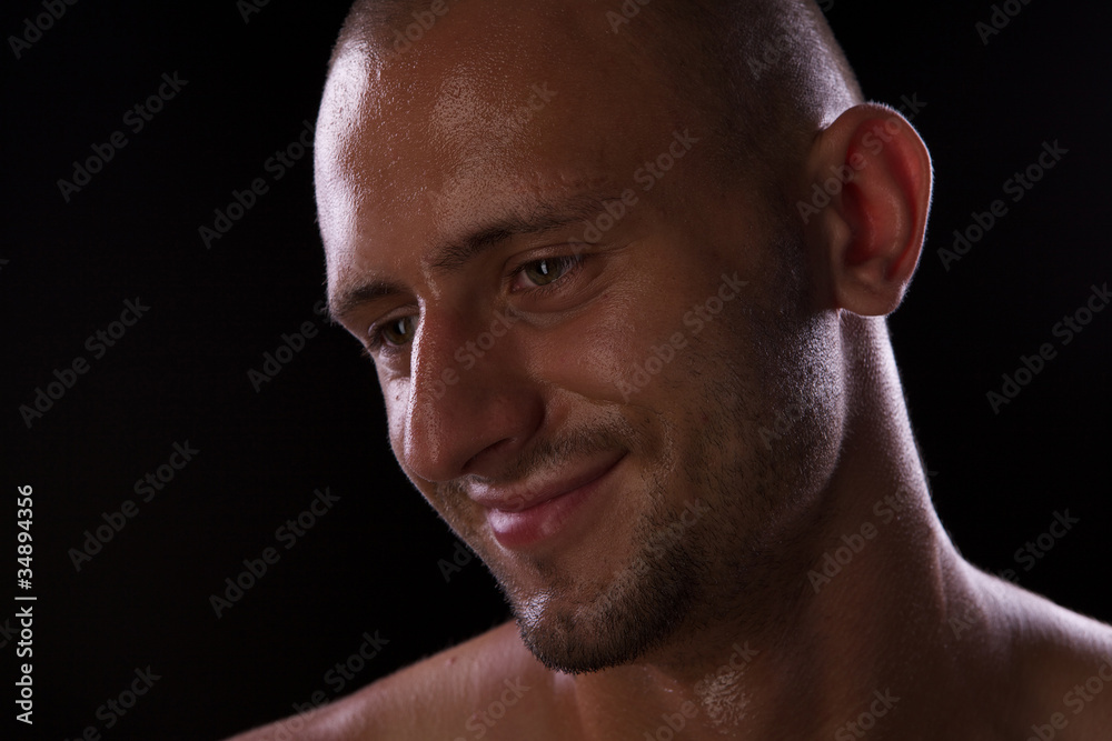 Young muscle bold male model in studio Stock Photo | Adobe Stock