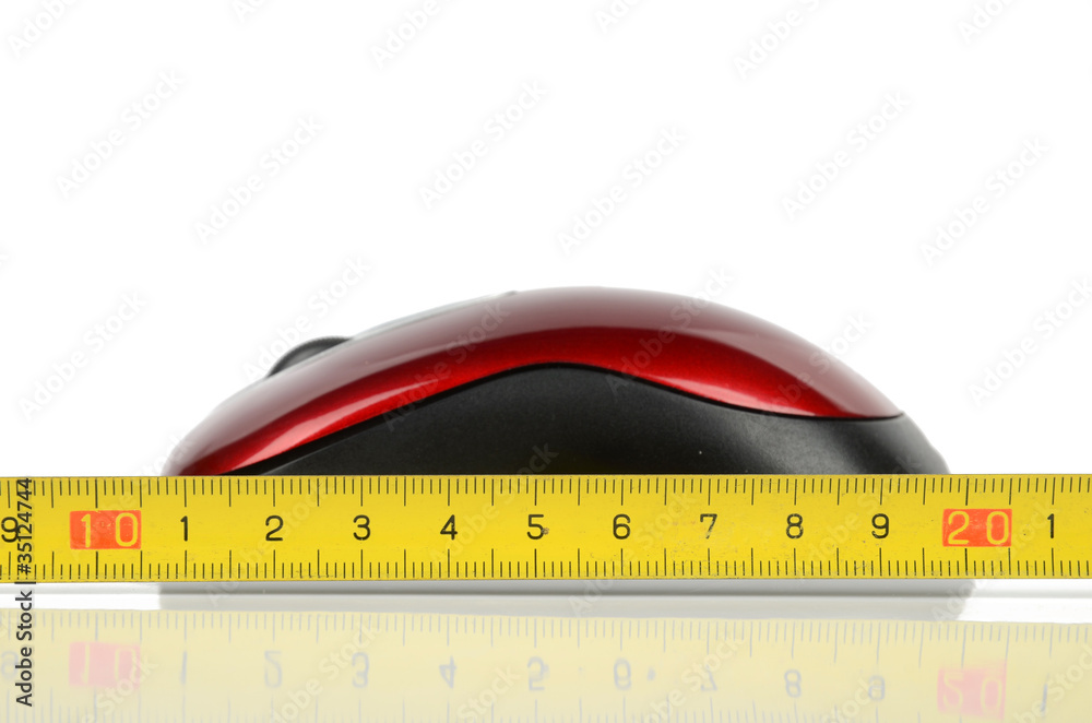 Computer mouse and ruler Stock Photo | Adobe Stock