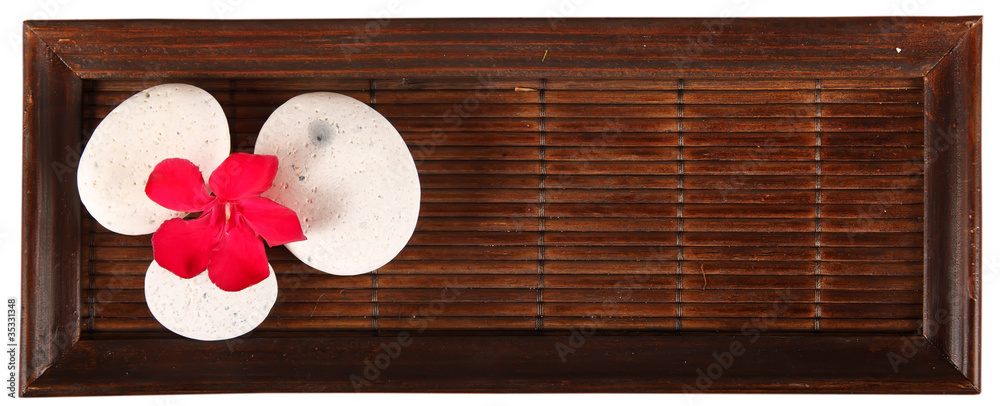 Tavolo in bambù con fiore di Oleandro e Ghiaie Stock Photo | Adobe Stock