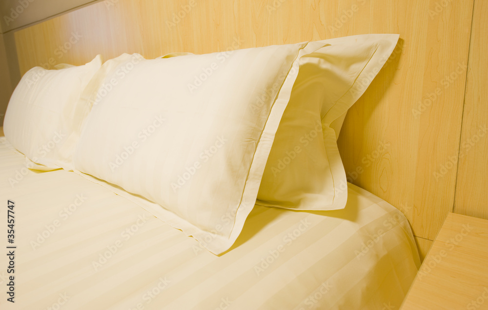 simple white bed Stock Photo | Adobe Stock