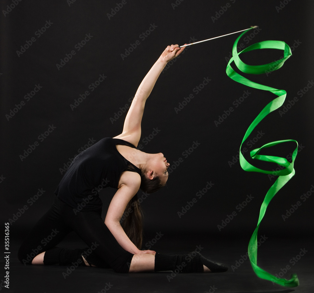 beautiful gymnast with green ribbon Stock Photo | Adobe Stock