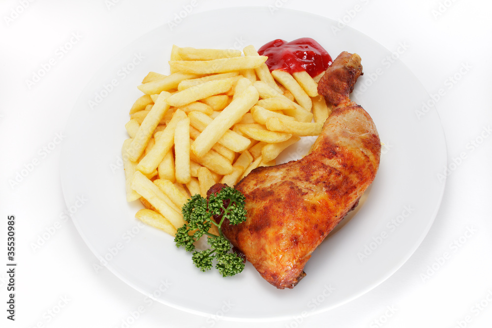 Hähnchenschenkel mit Pommes frites Stock Photo | Adobe Stock