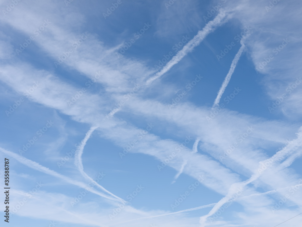 Sky with many different contrails aka vapour trails Stock Photo | Adobe ...