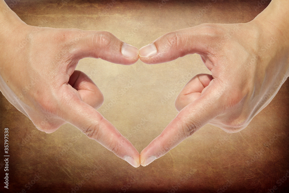 Mani che formano un cuore - texture retro Stock Photo | Adobe Stock