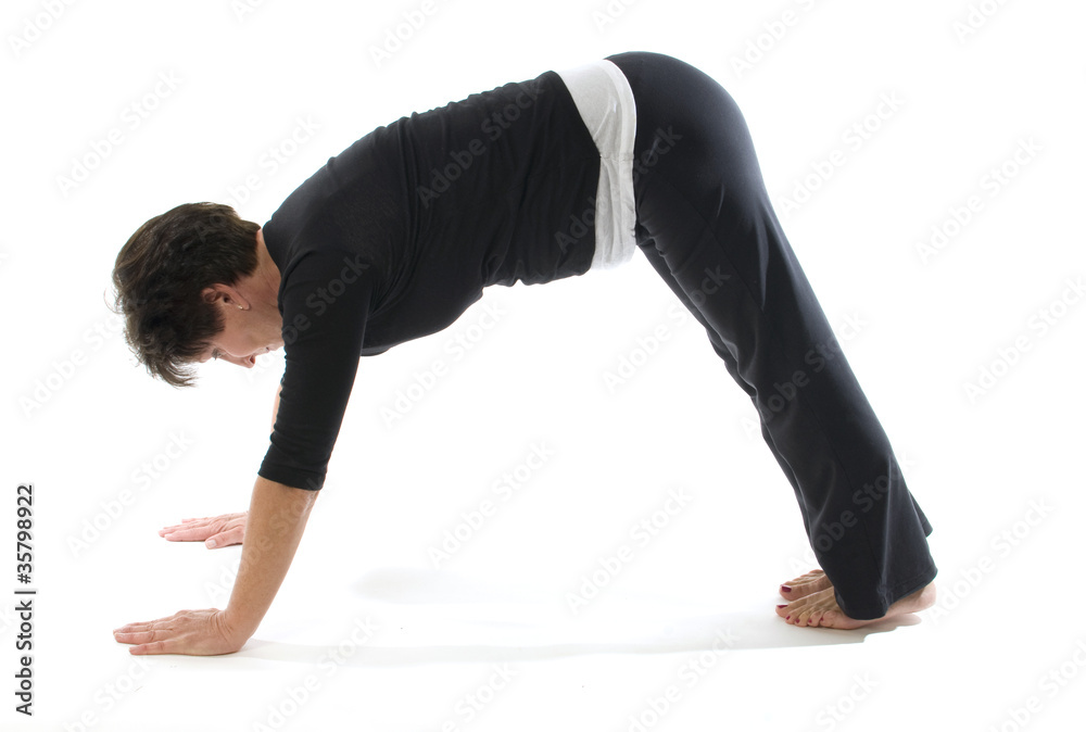female yoga position downward facing dog pose Stock Photo | Adobe Stock