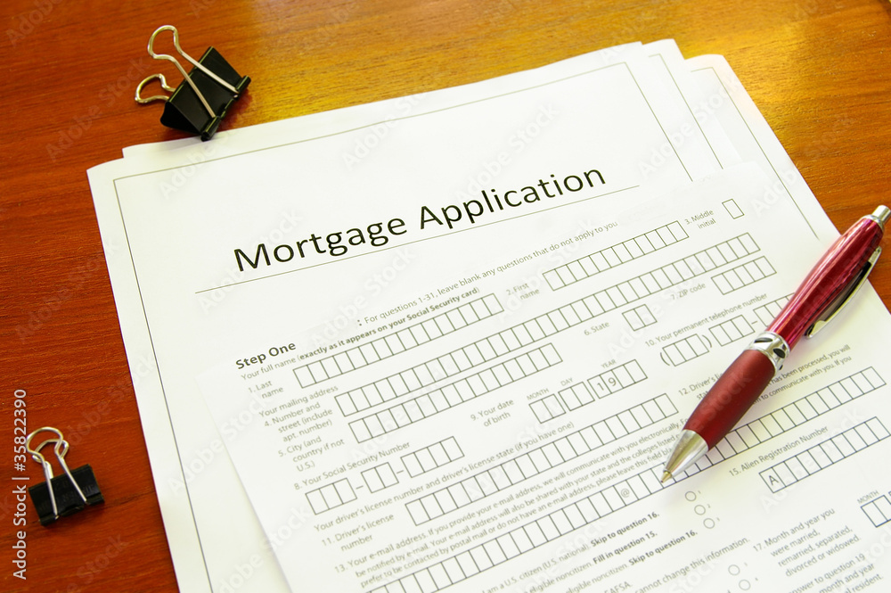 Blank mortgage application with pen and clips Stock Photo | Adobe Stock
