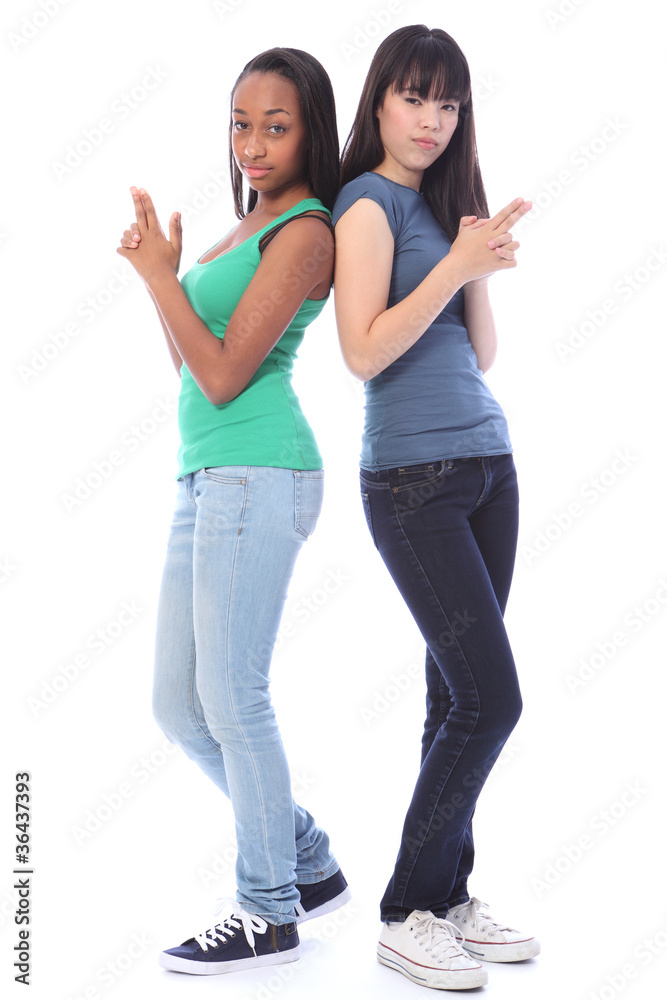 Teenage girls playful secret agent fun gun pose Stock Photo | Adobe Stock