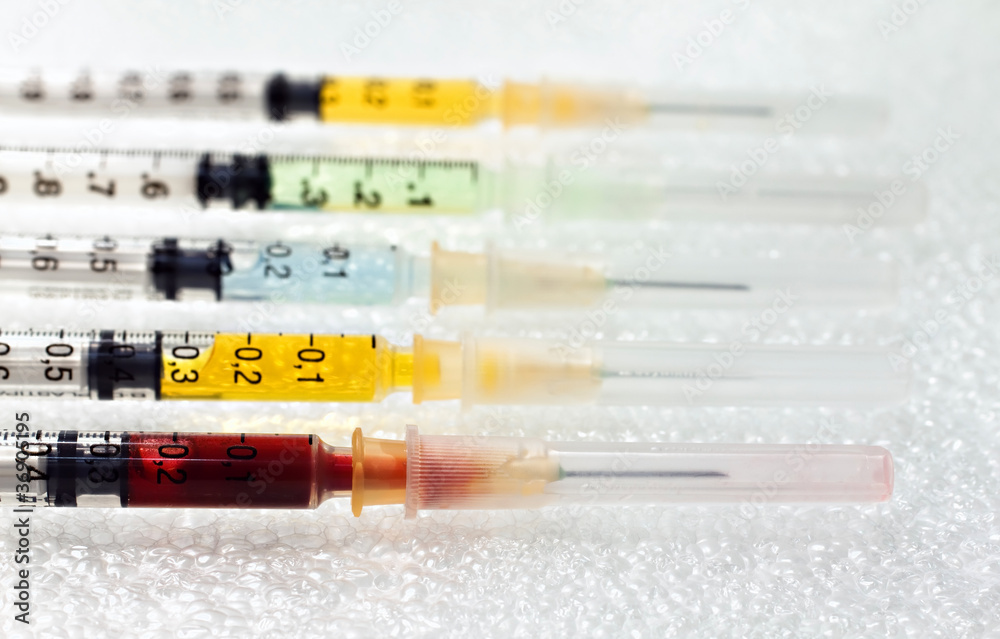 syringes with medication. Stock Photo | Adobe Stock