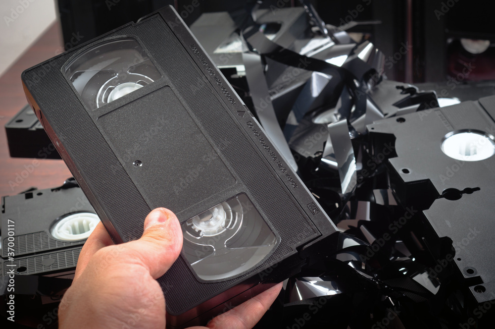 Old VHS tapes ripped apart Stock Photo | Adobe Stock
