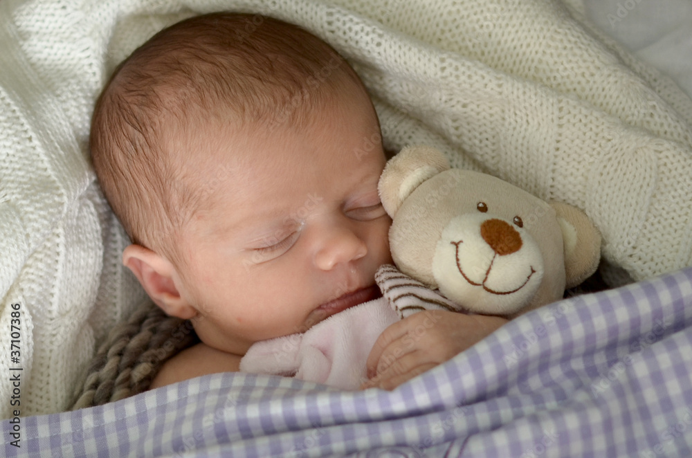 Baby mit Teddybär Stock-Foto | Adobe Stock