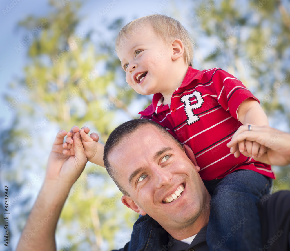 Young Laughing Father and Child Piggy Back Stock Photo | Adobe Stock