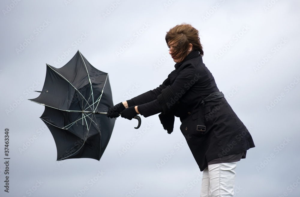 Fighting against the wind Stock Photo | Adobe Stock