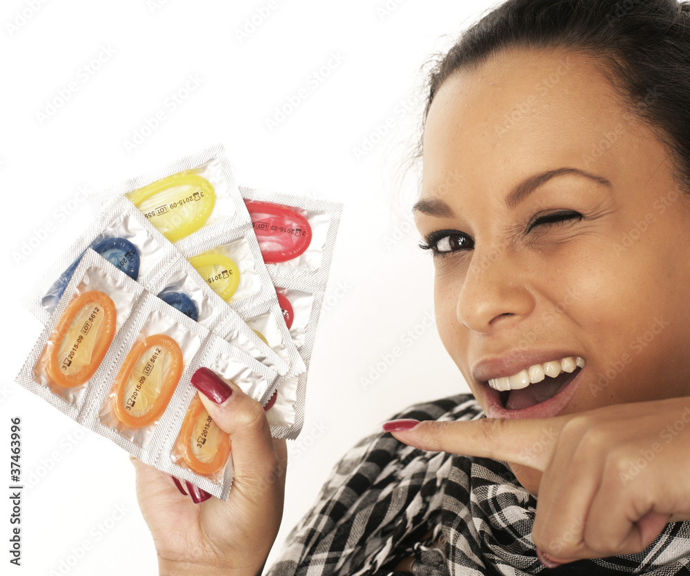 Frau zeigt auf Condome Stock Photo | Adobe Stock