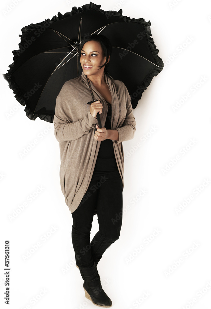 schöne Frau mit Schirm Stock-Foto | Adobe Stock