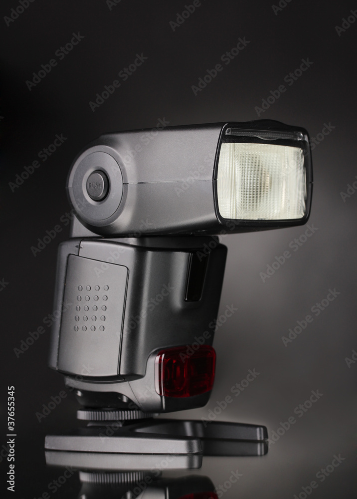 Photo camera flash on black background Stock Photo | Adobe Stock