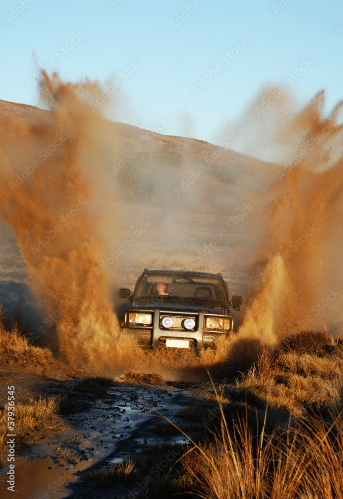 4wd splash in mud at speed Stock Photo | Adobe Stock
