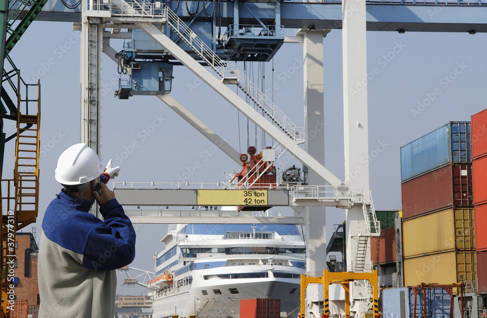 dock worker, containers, ships and cranes Stock Photo | Adobe Stock