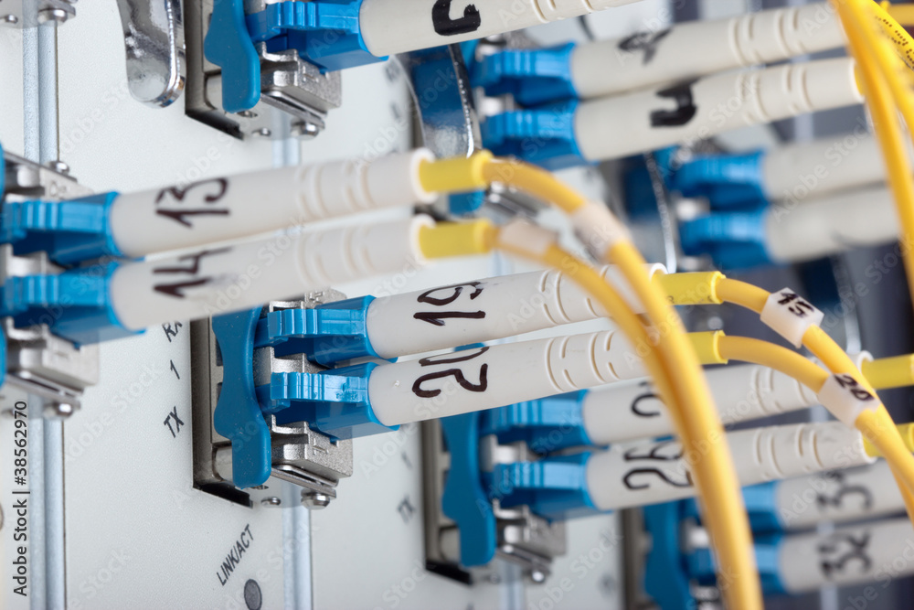 Core router. The bottom view. Row of fiber optic ports. foto de Stock ...