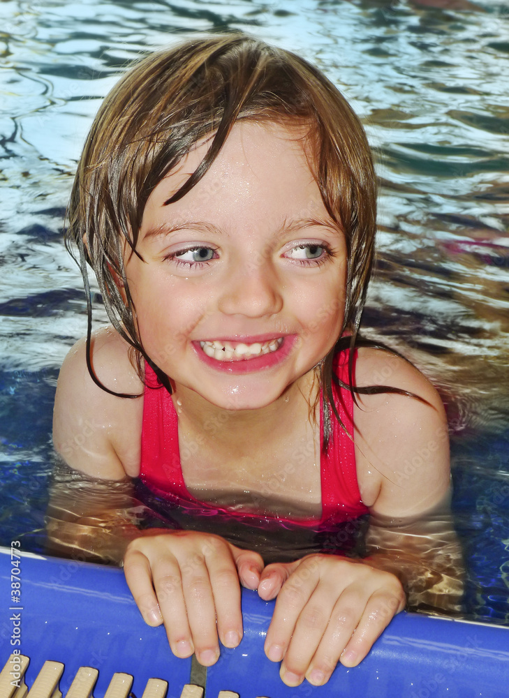 little girl five years old learning to swim Stock Photo | Adobe Stock
