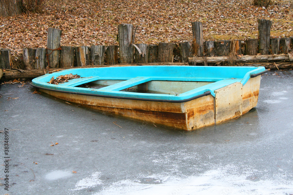 wreck of a boat blocked by ice Stock Photo | Adobe Stock