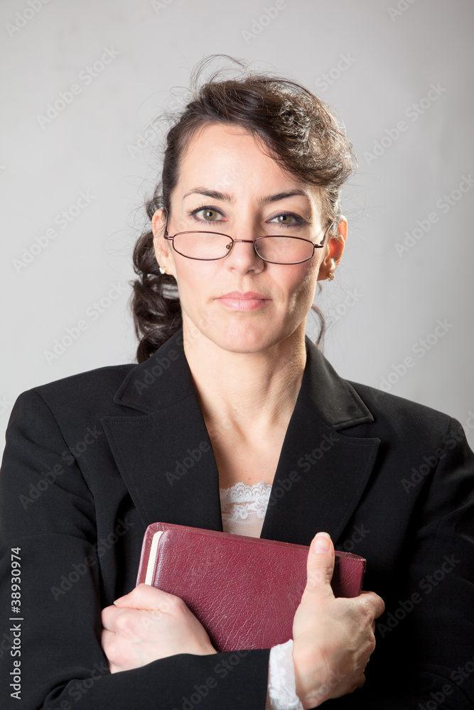 Stern Sunday school teacher with her bible Stock Photo | Adobe Stock